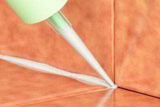 Correctly Apply Mastic Adhesive | DoItYourself.com