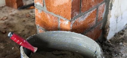 Applying Artificial Stone Veneer Over Stucco | DoItYourself.com