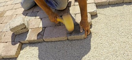 How to Install a Paver Walkway on a Slope | DoItYourself.com