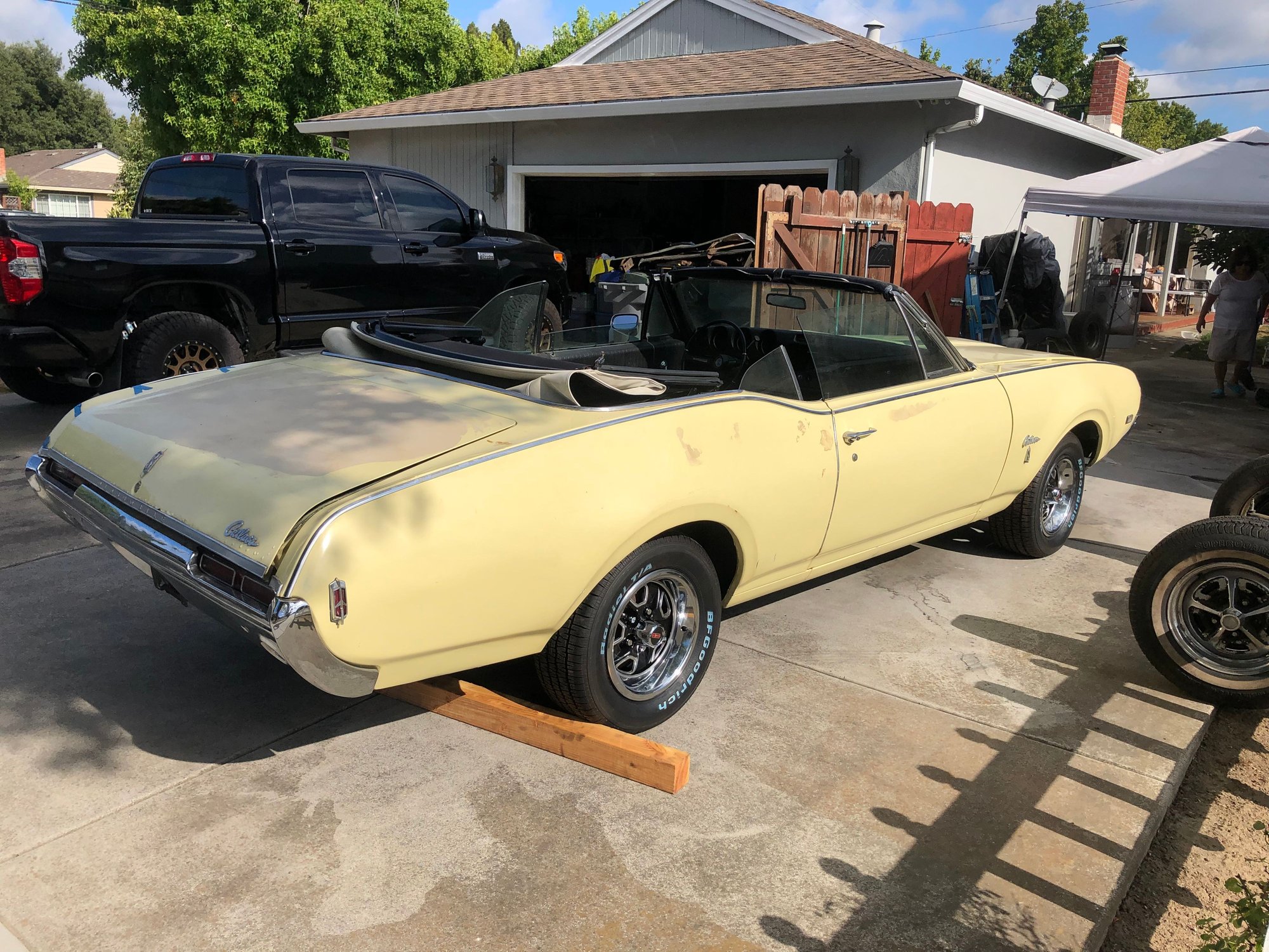 1968 cutlass convertible on the road - ClassicOldsmobile.com