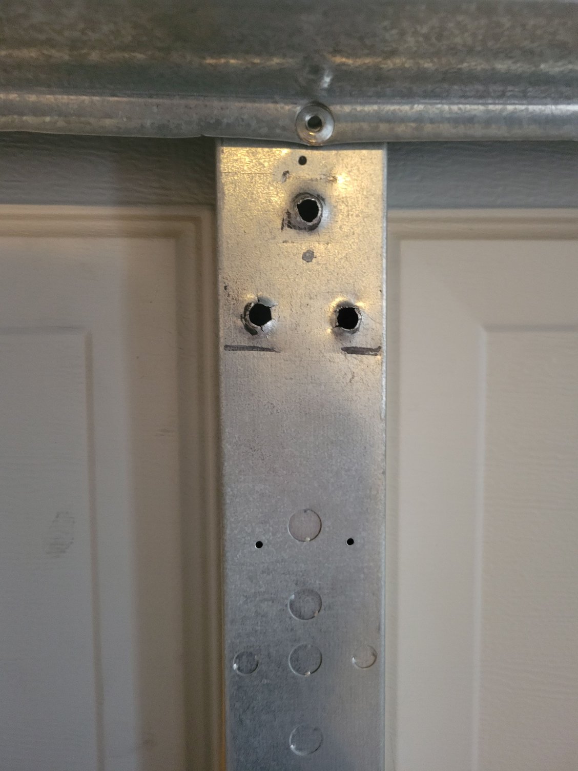 Garage door lifting screw stripped metal and loose - DoItYourself.com ...