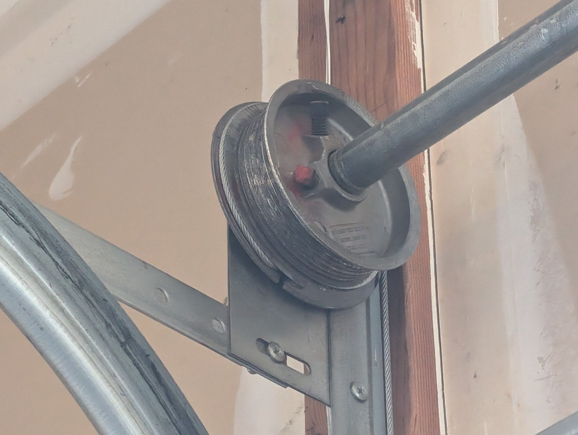 Garage pulley cable keeps jumping off the pulley - DoItYourself.com Community Forums
