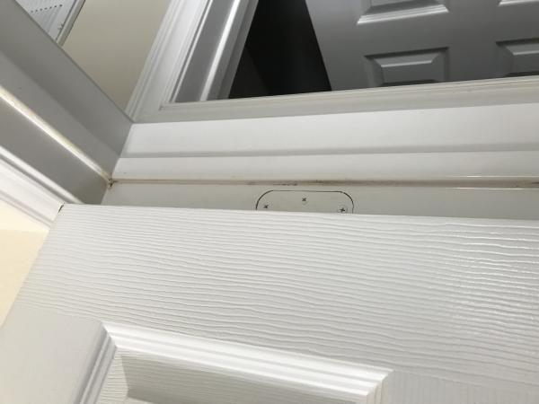 Black dust / yellow film build up around door jamb / trim ...