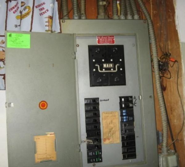 1960s Main Panel with pullout fuse disconnect serving multiple ...