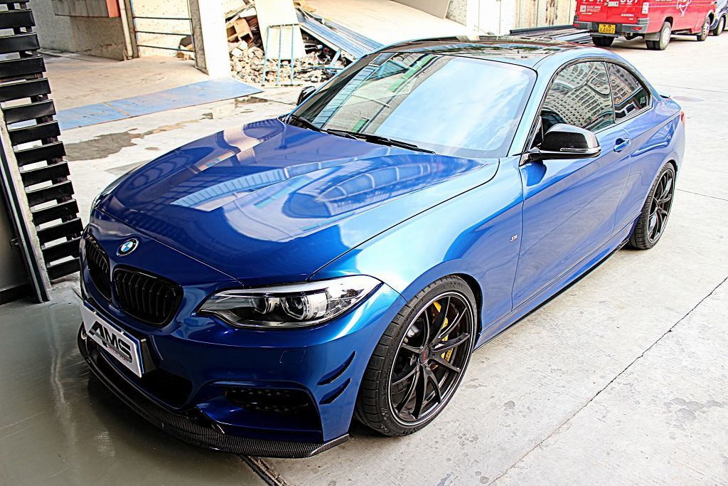 Blue BMW M235i triplets facelift with full Armytrix Valvetronic Exhaust ...